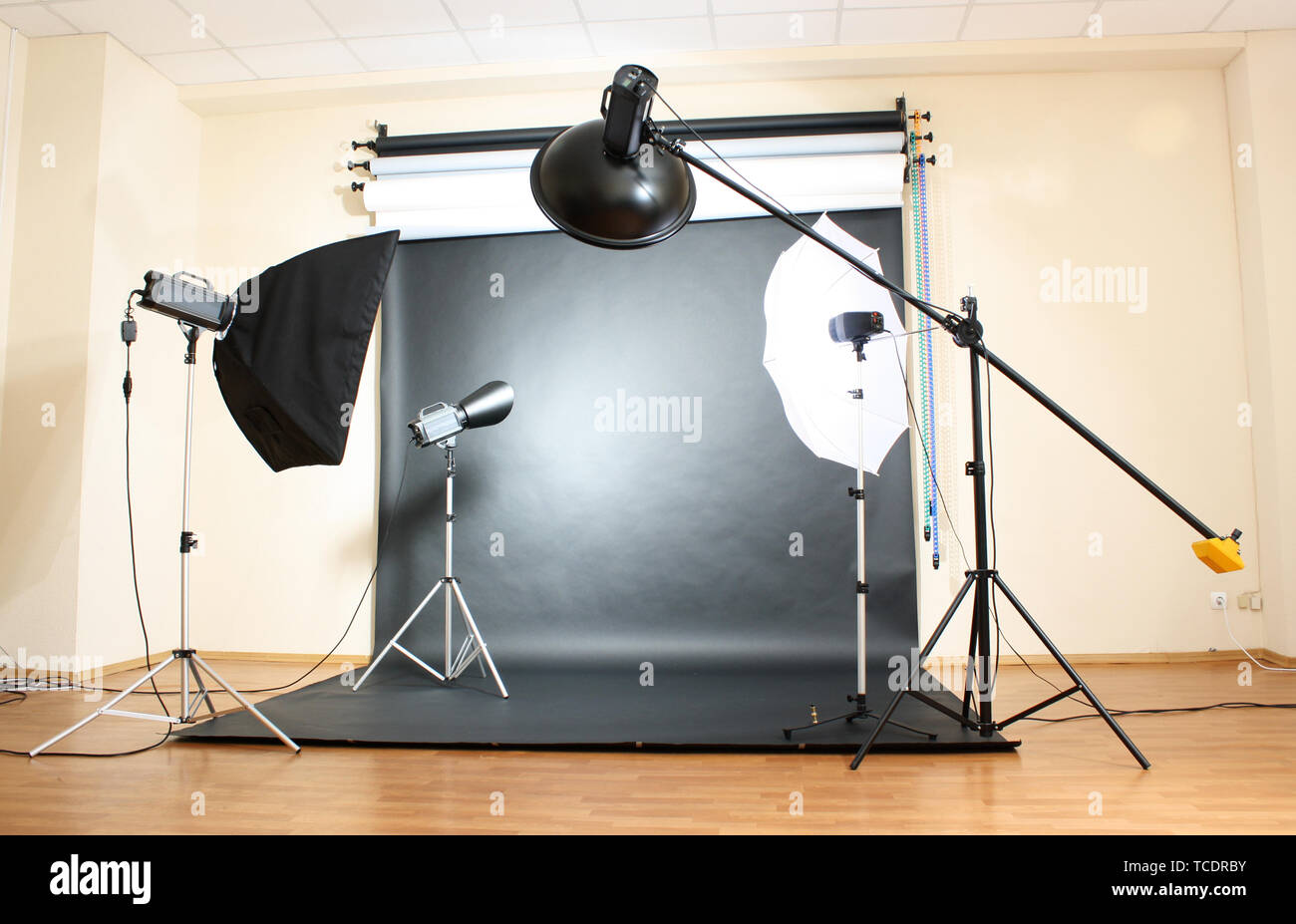 Studio flash on grey background Stock Photo - Alamy