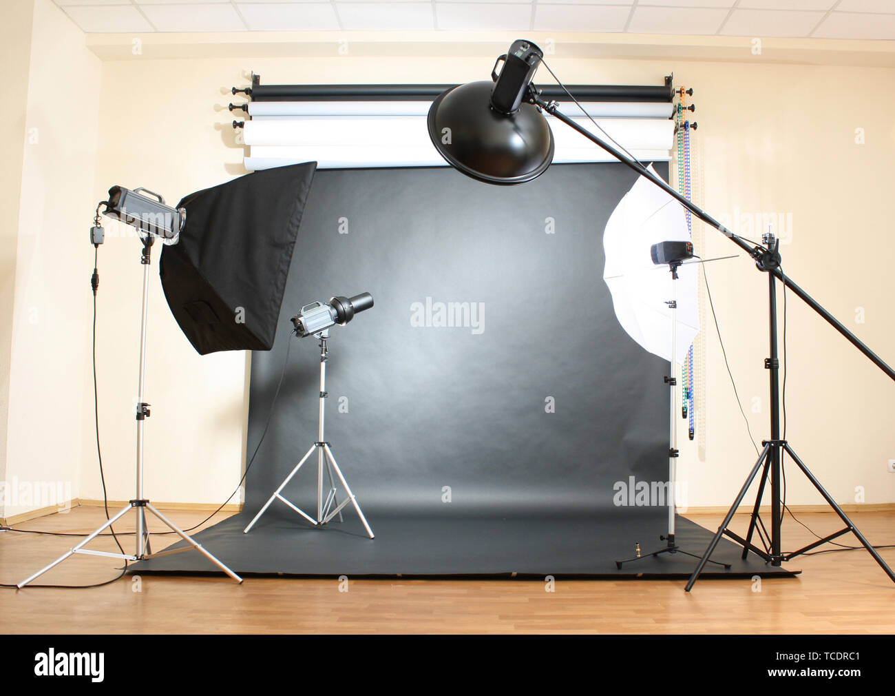Studio flash on grey background Stock Photo - Alamy