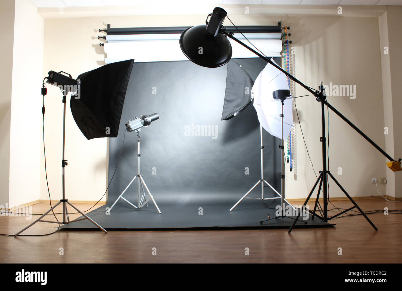 Studio flash on grey background Stock Photo - Alamy