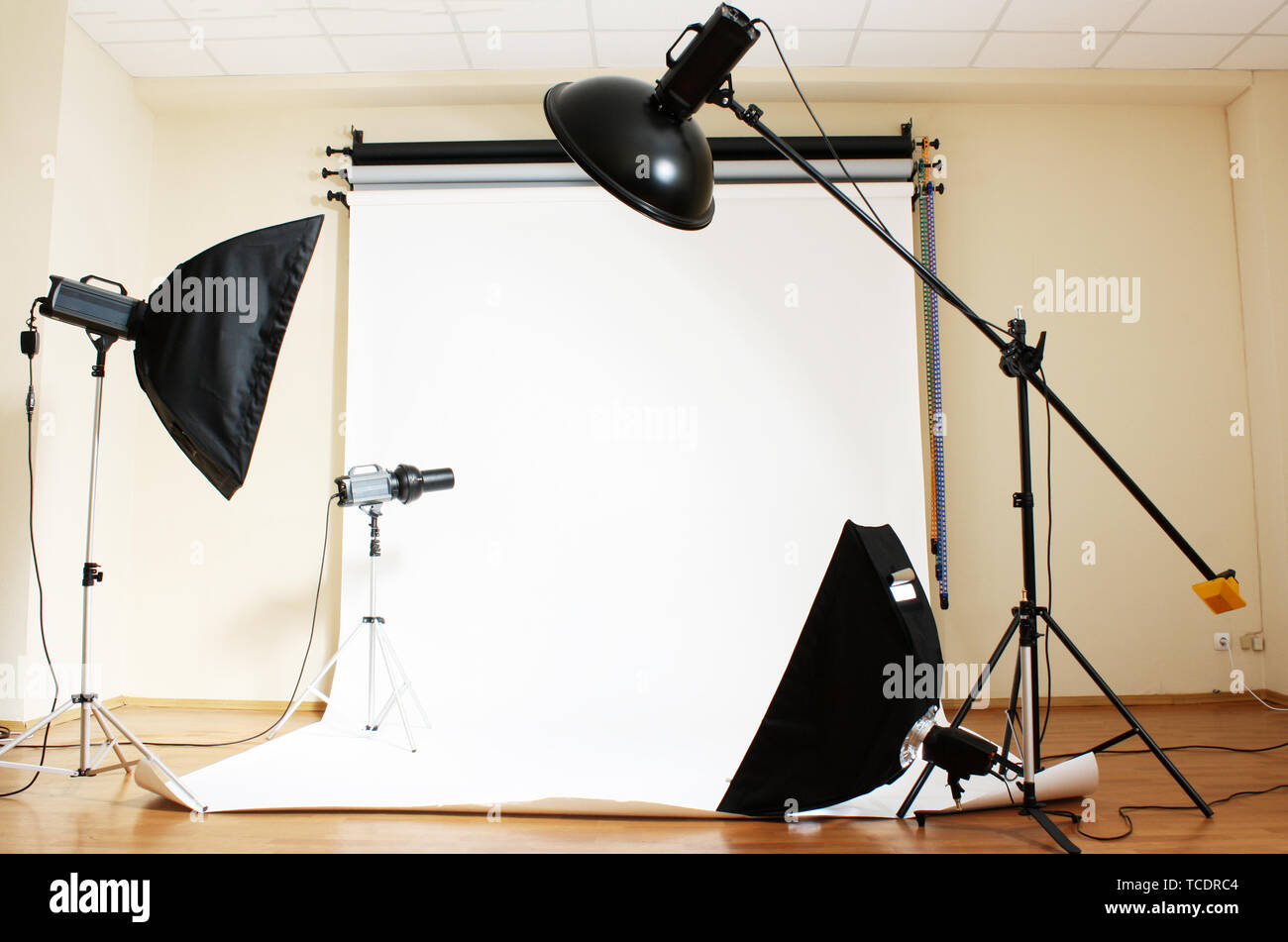 Studio flash on grey background Stock Photo - Alamy