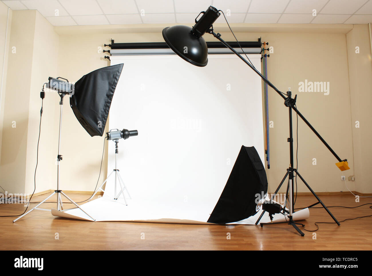Studio flash on grey background Stock Photo - Alamy