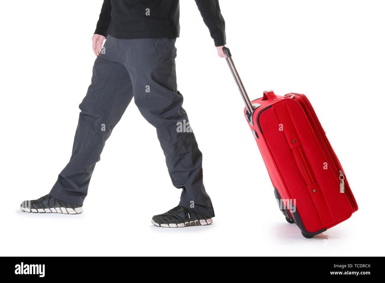 Man walking with suitcase isolated on white Stock Photo - Alamy