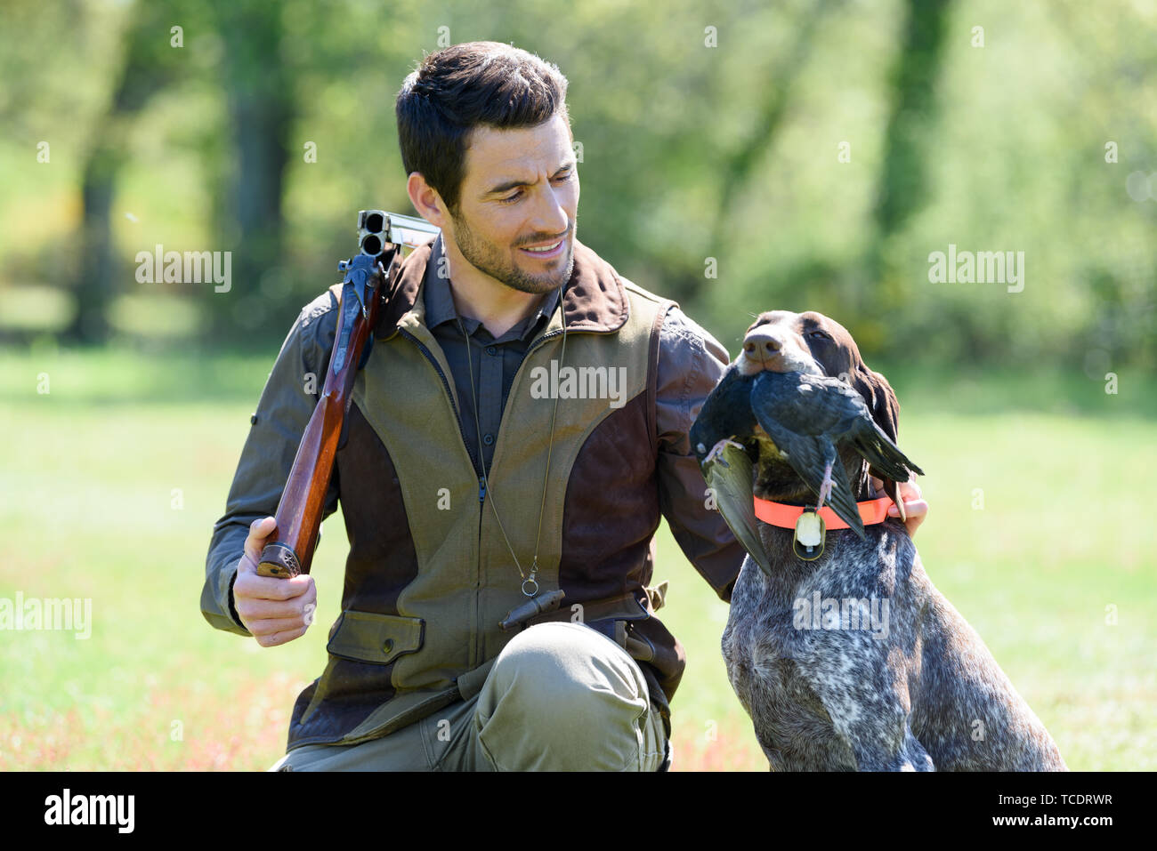 hunter with hunting dog Stock Photo - Alamy