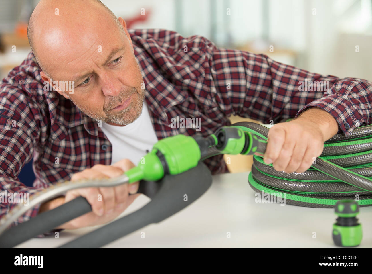man conduits pipe connection Stock Photo - Alamy