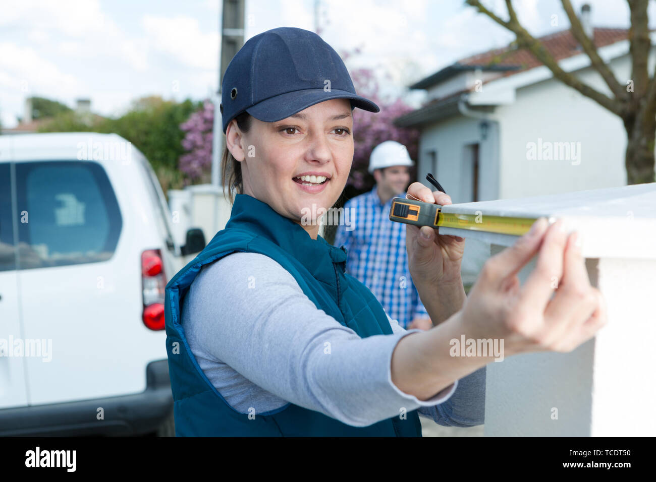 measuring exterior walls Stock Photo - Alamy