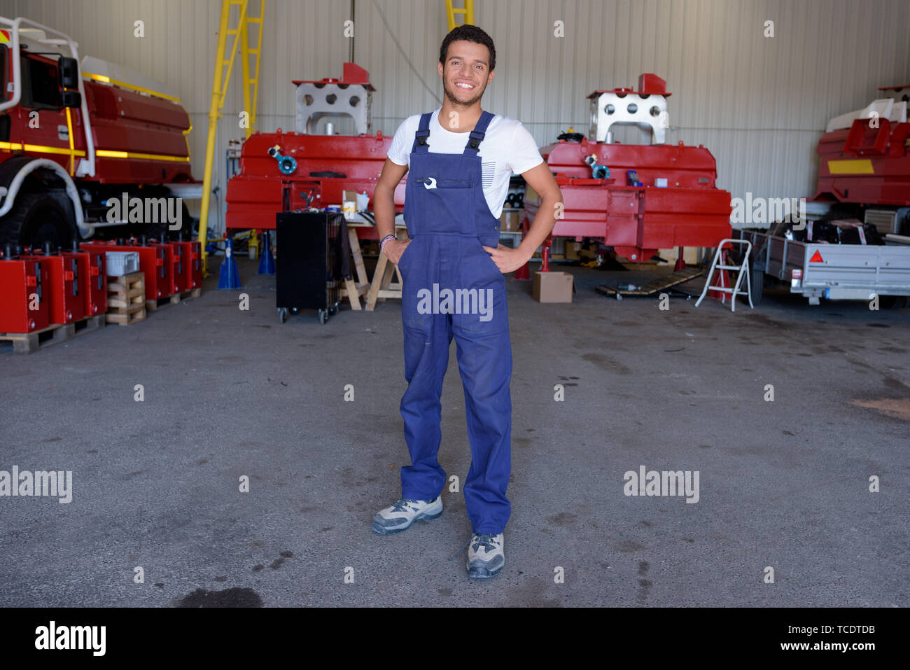 auto mechanic looks at camera Stock Photo - Alamy