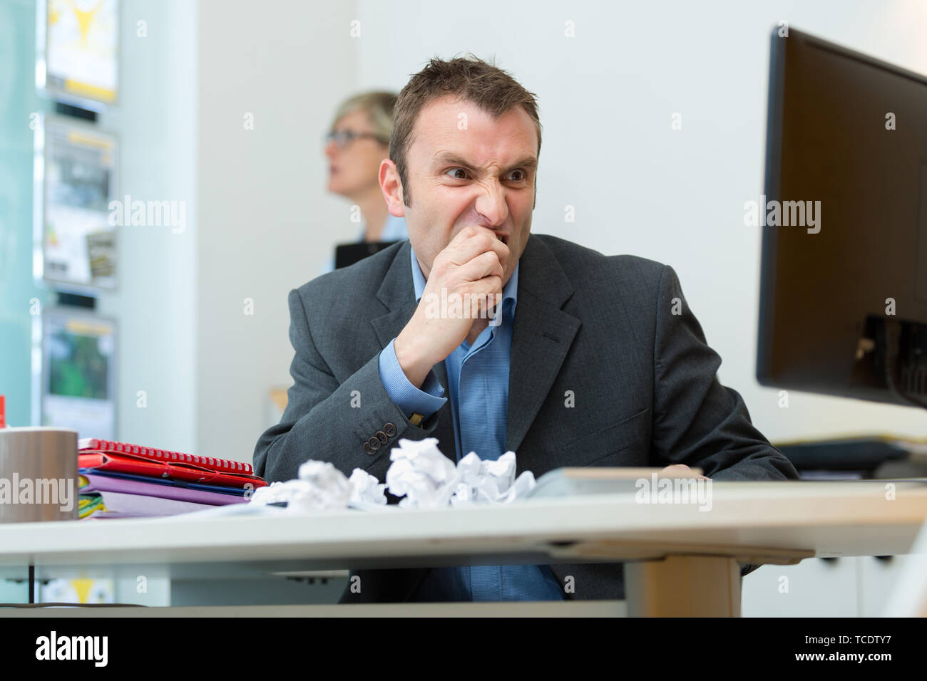 Middle aged man technology frustrated hi-res stock photography and ...