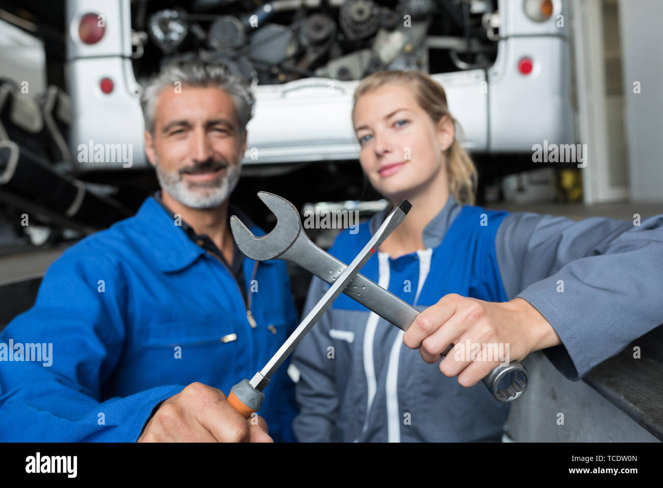 mechanics posing in a playful pose Stock Photo - Alamy