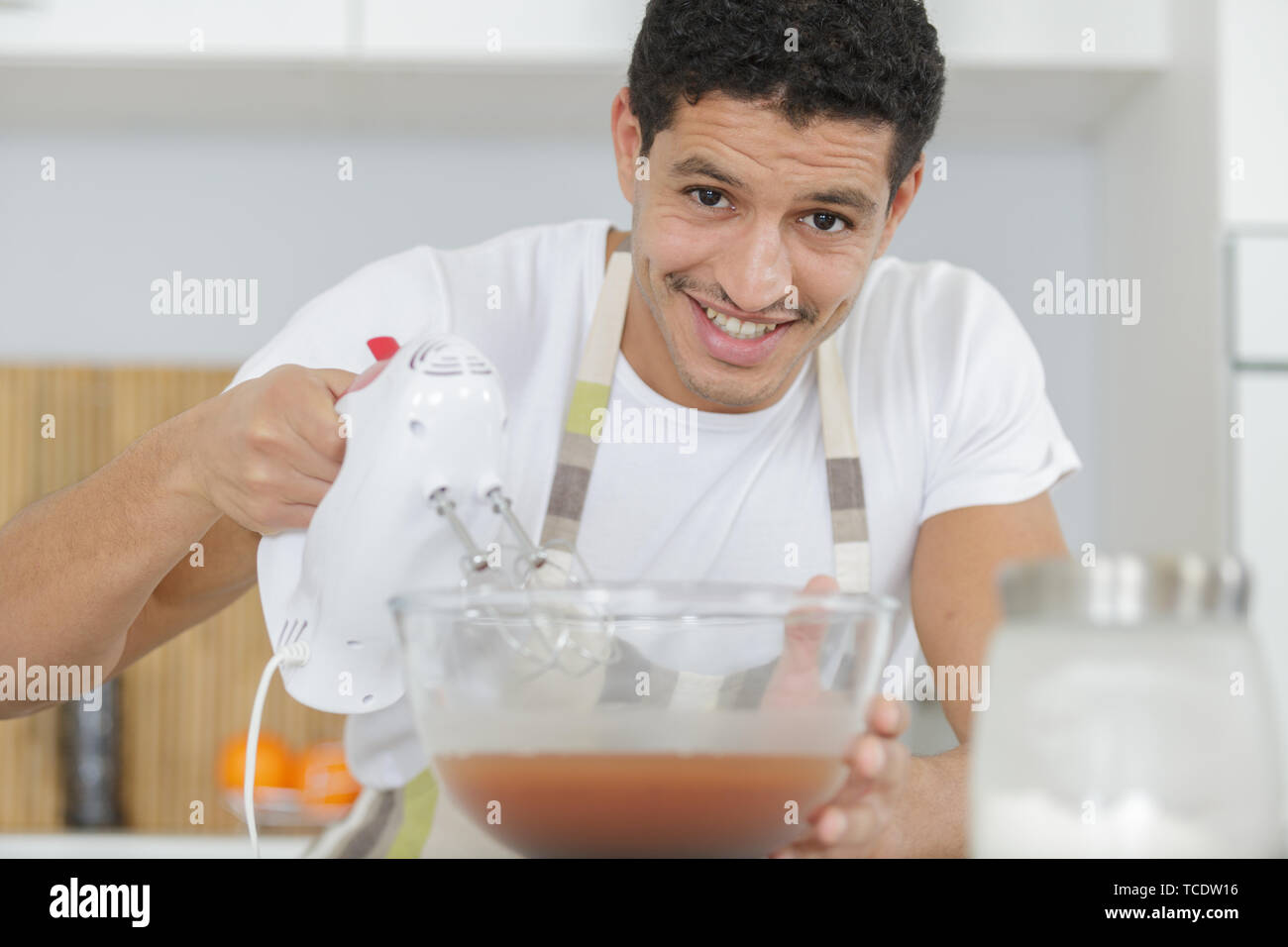 man making a cake Stock Photo - Alamy