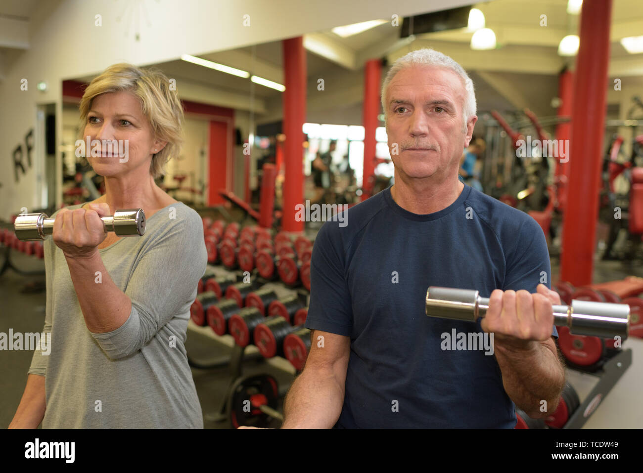 Senior couple lifting exercise hi-res stock photography and images - Alamy