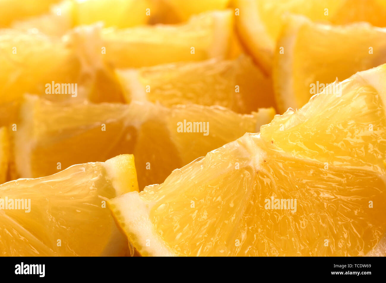 Freshly sliced lemons closeup Stock Photo - Alamy