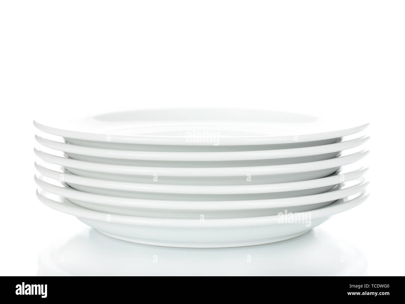 empty plates isolated on white Stock Photo - Alamy