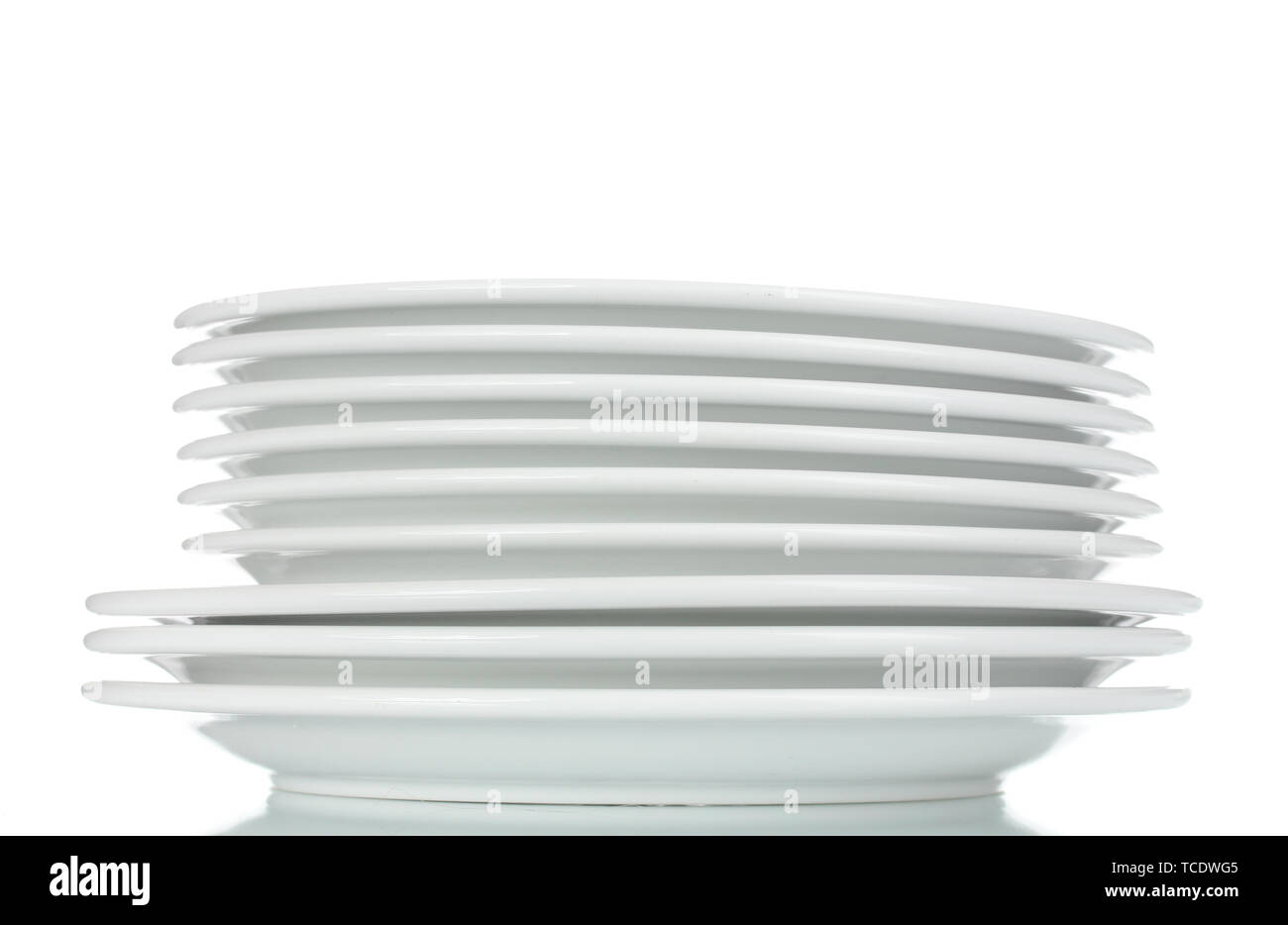 empty plates isolated on white Stock Photo - Alamy