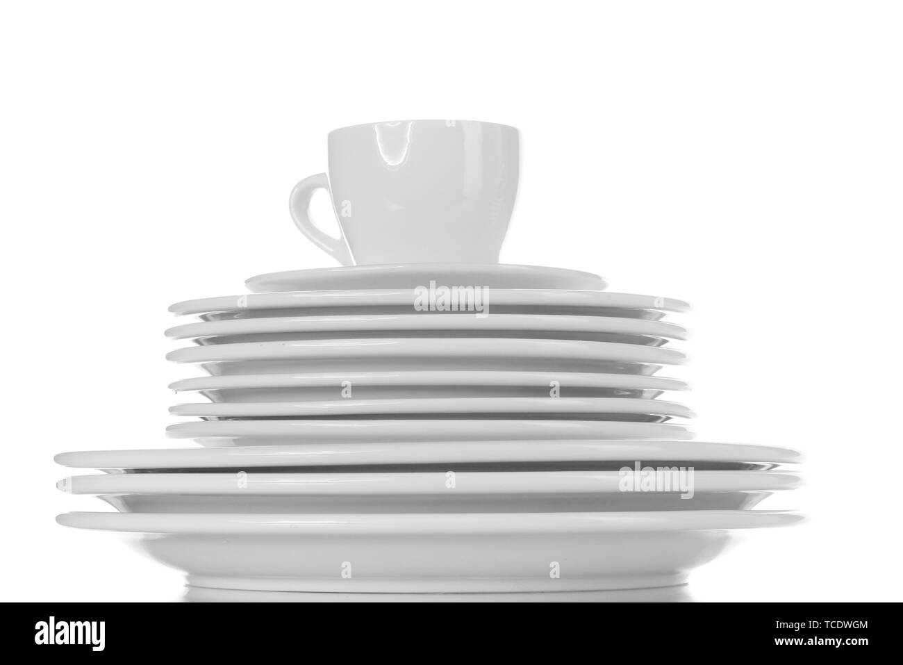 empty plates and cup isolated on white Stock Photo - Alamy
