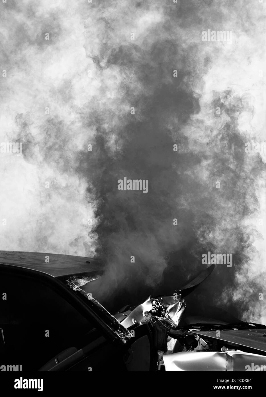 dense smoke from a damaged car after the road accident Stock Photo - Alamy