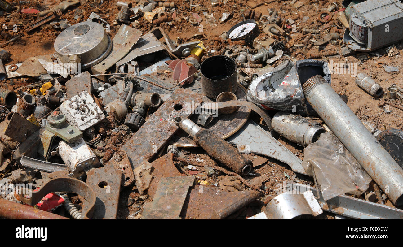 background of many wasted rusted objects in the junkyard Stock Photo ...