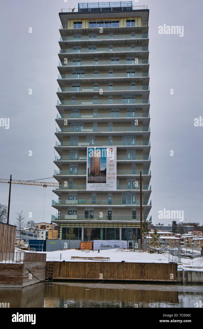 Construction of new high-rise apartment block in winter, Norrtalje ...