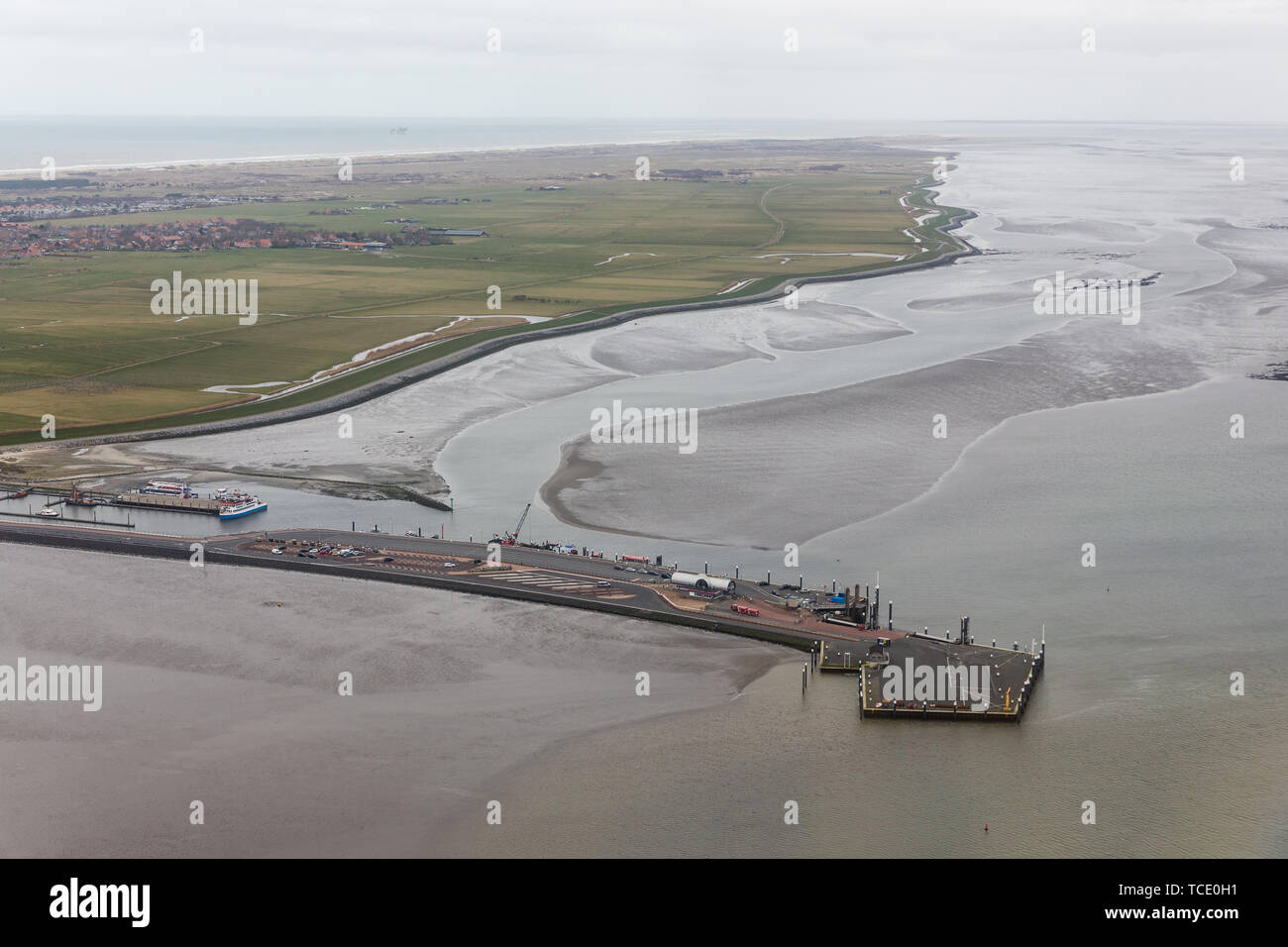 Aerial view Dutch island Ameland with pier and ferry terminal Stock ...