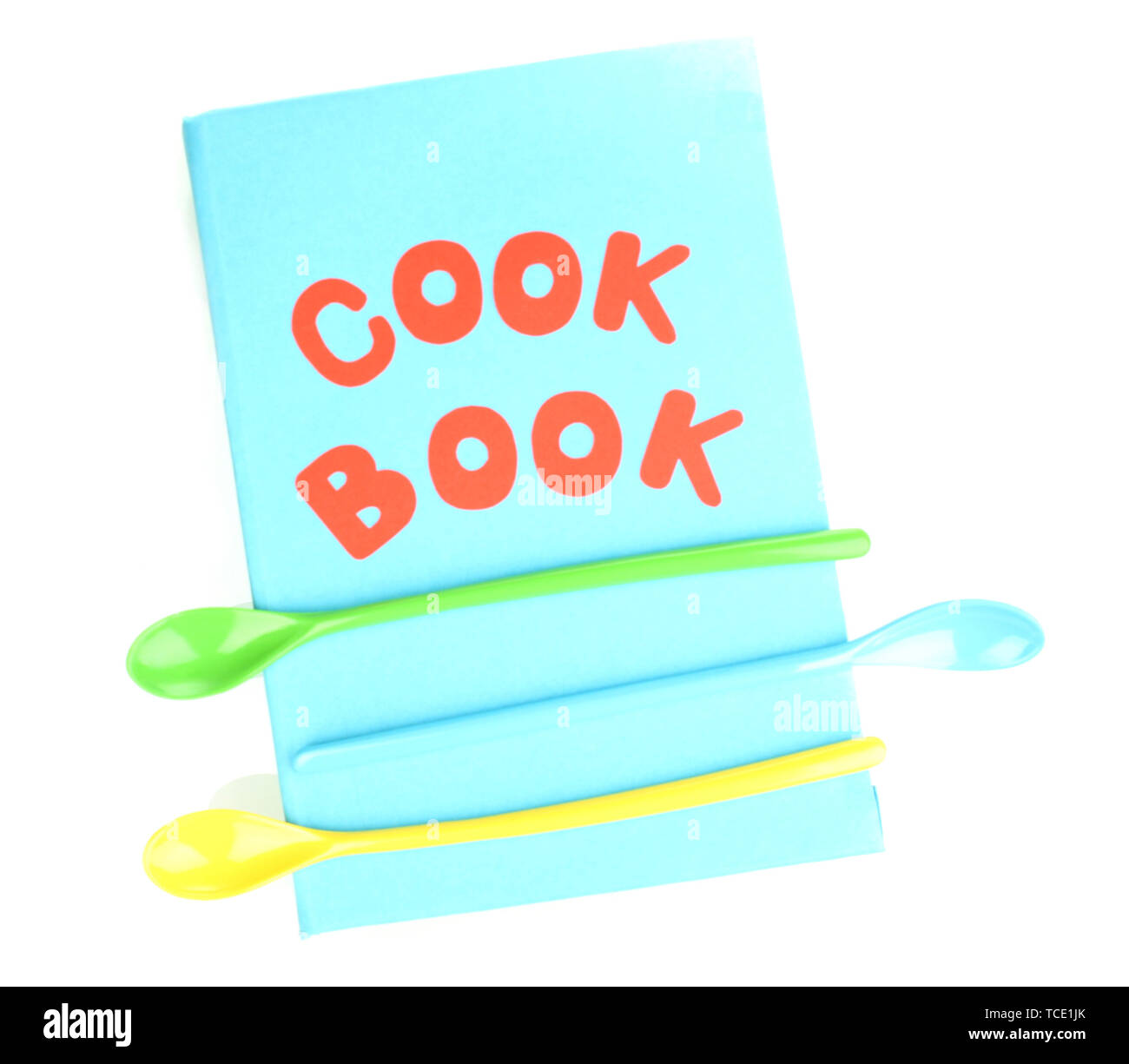 Blue cookbook and kitchenware isolated on white Stock Photo - Alamy