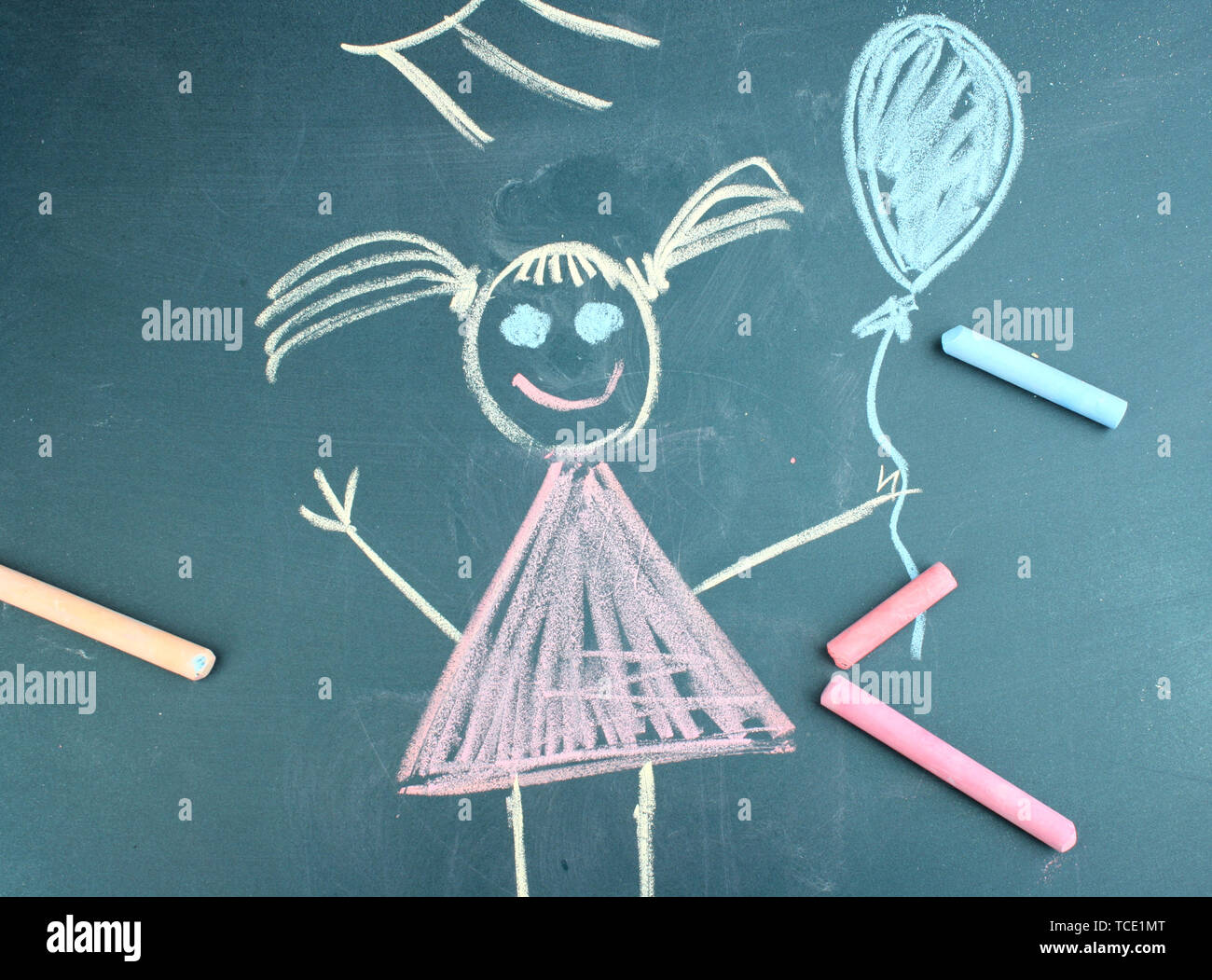 Little girl, child's drawing with chalk Stock Photo - Alamy