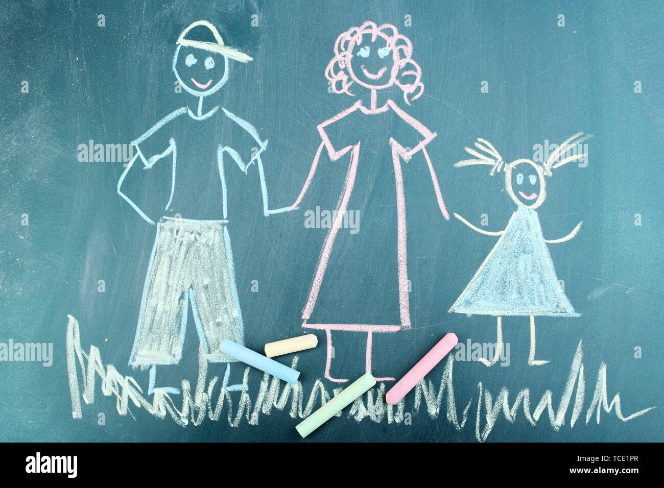 Happy family, child's drawing with chalk Stock Photo - Alamy