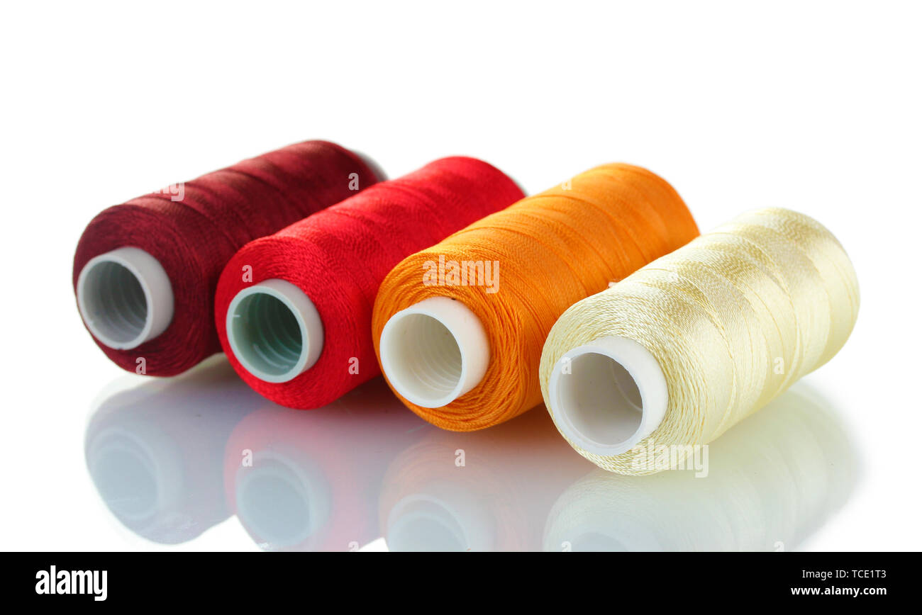 bright bobbin thread isolated on white Stock Photo - Alamy