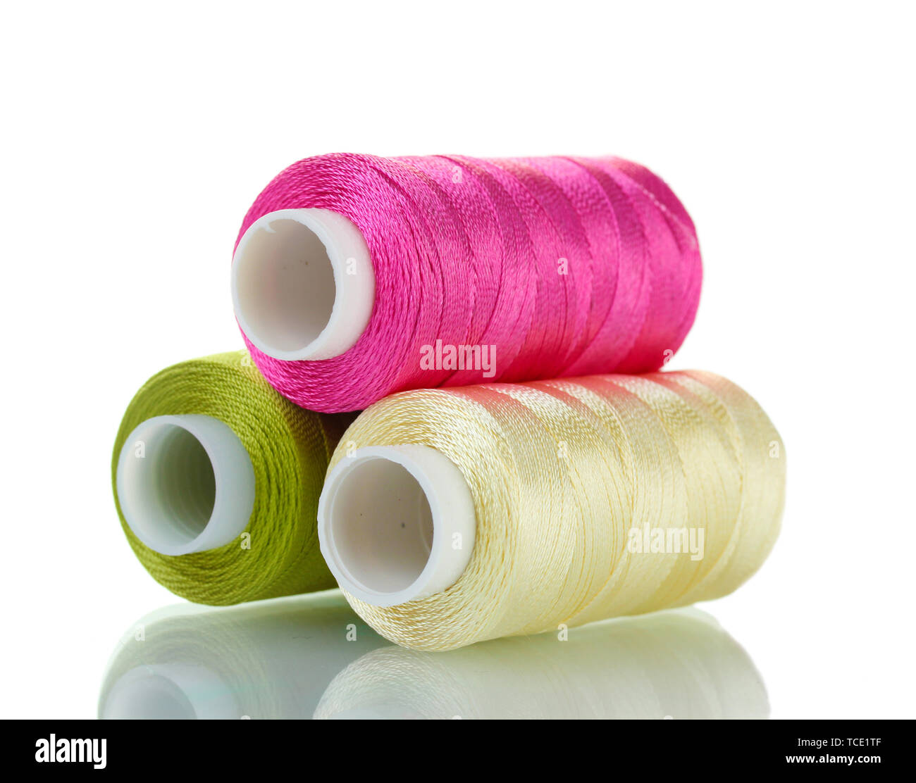 bright bobbin thread isolated on white Stock Photo - Alamy