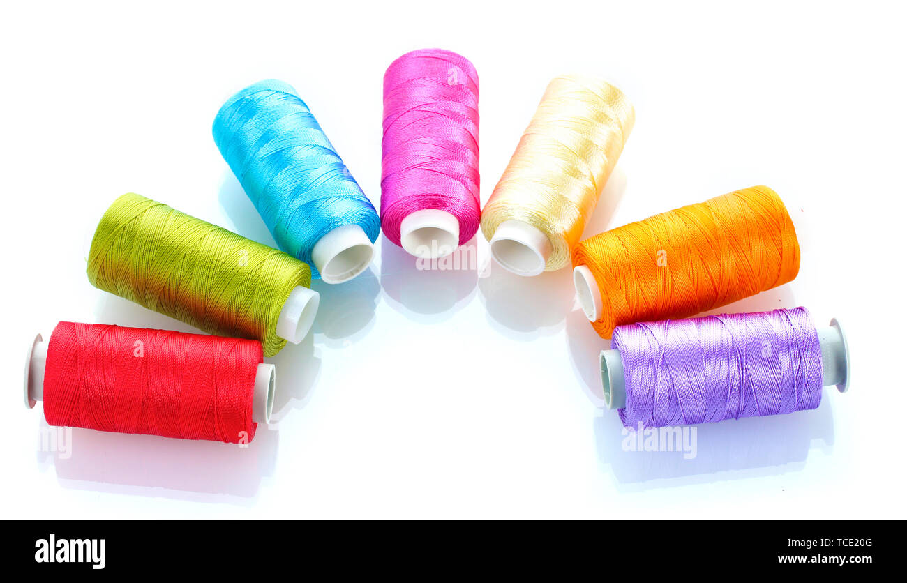bright bobbin thread isolated on white Stock Photo - Alamy