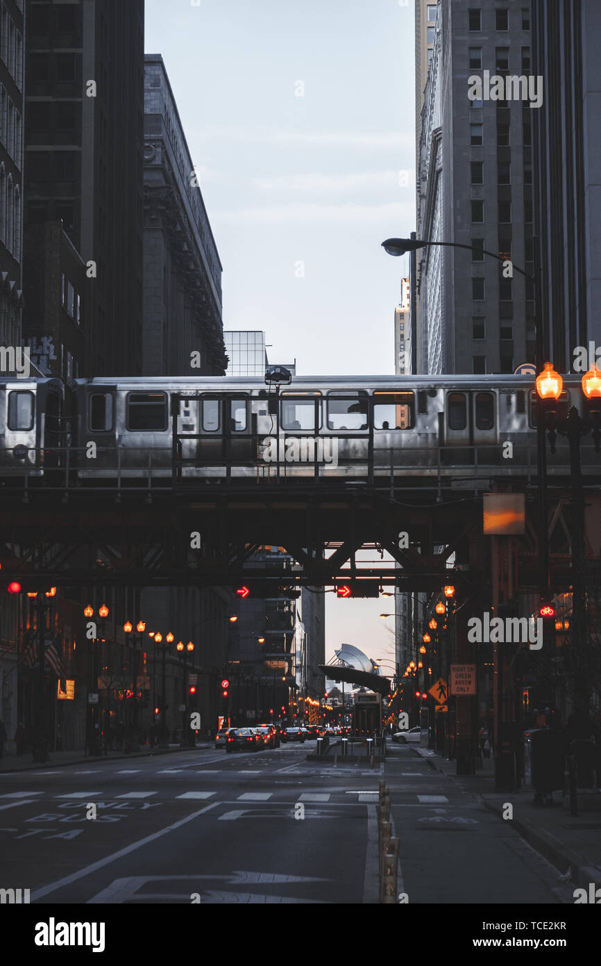 Train driving along elevated railway track, Chicago, Illinois, United ...