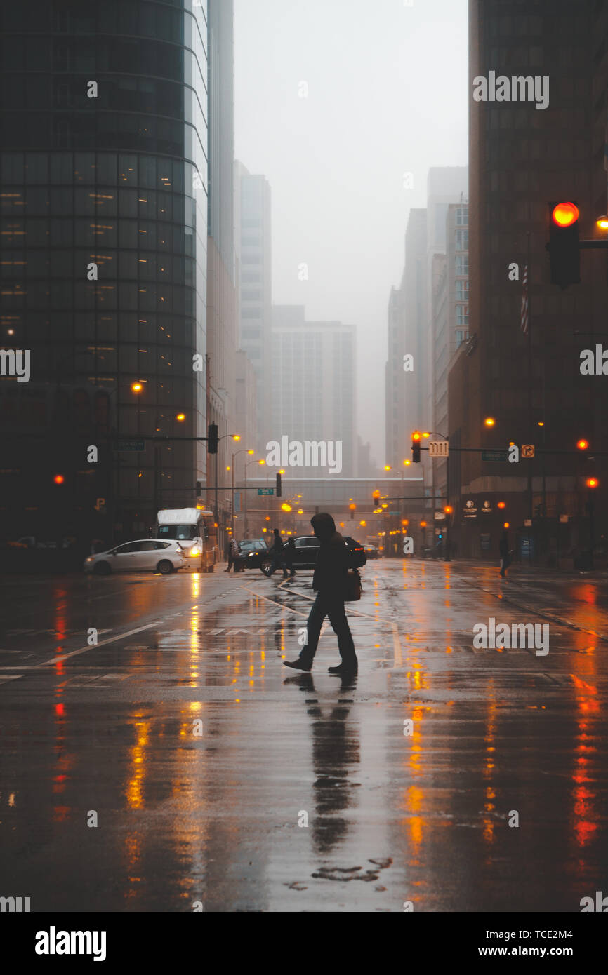 Man walking rain vertical hi-res stock photography and images - Alamy