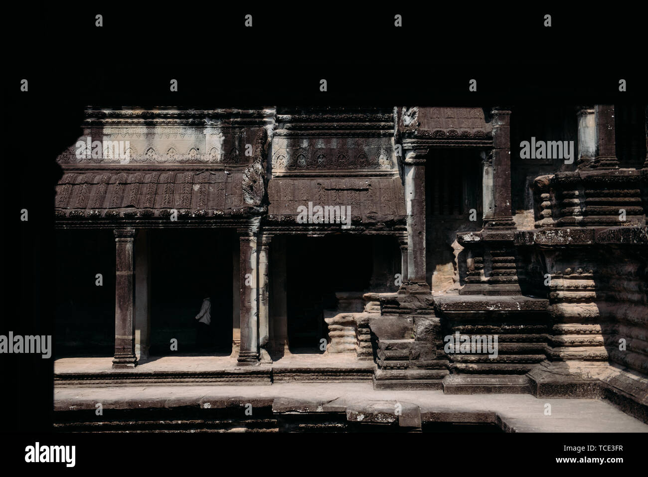 Man walking amongst Temple ruins, Angkor Wat, Siem Reap, Cambodia Stock ...
