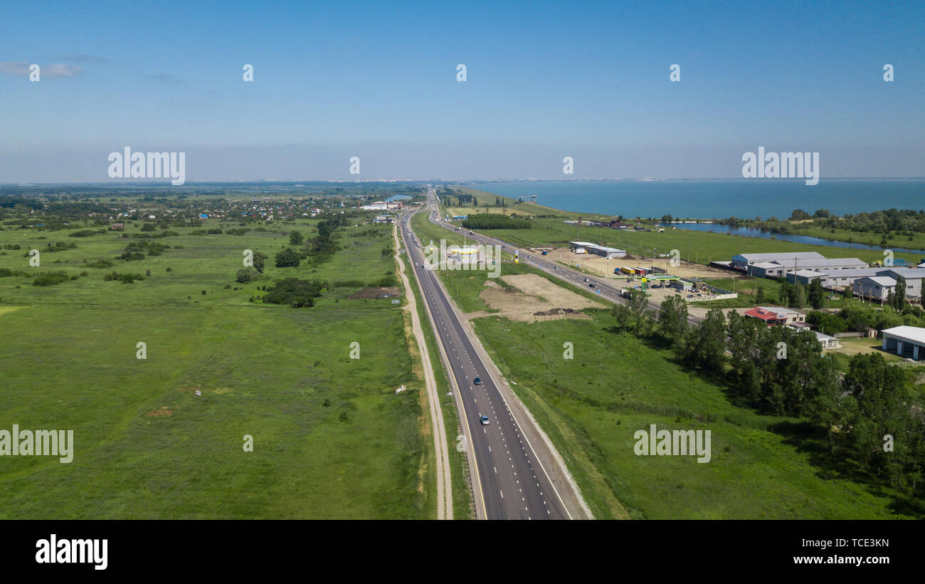 Aerial flying under highway traffic road with cars and truck Stock ...