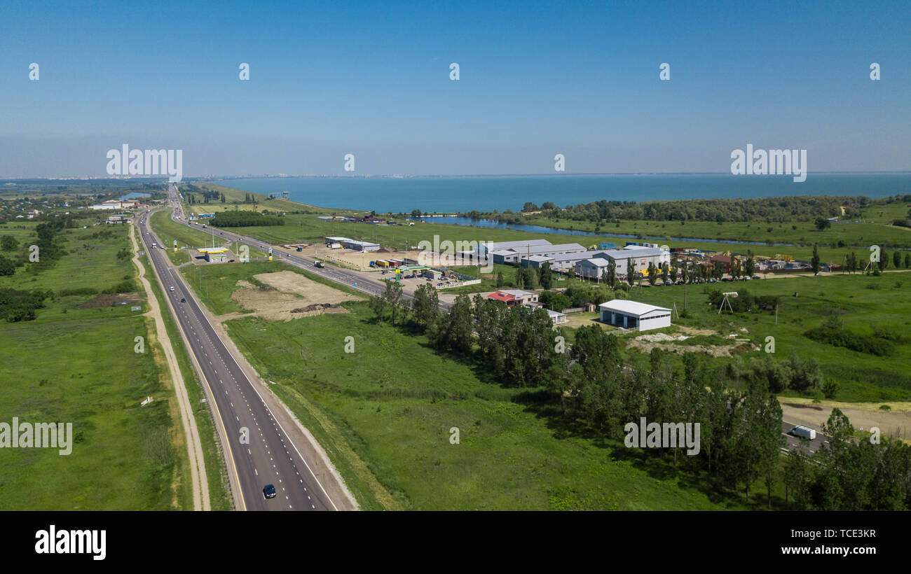 Aerial flying under highway traffic road with cars and truck Stock ...