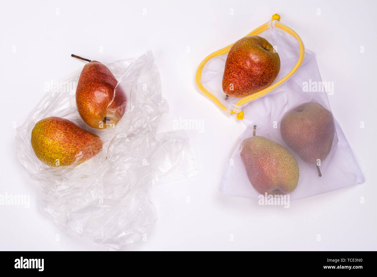 Fresh pears in eco and plastic bags Stock Photo - Alamy