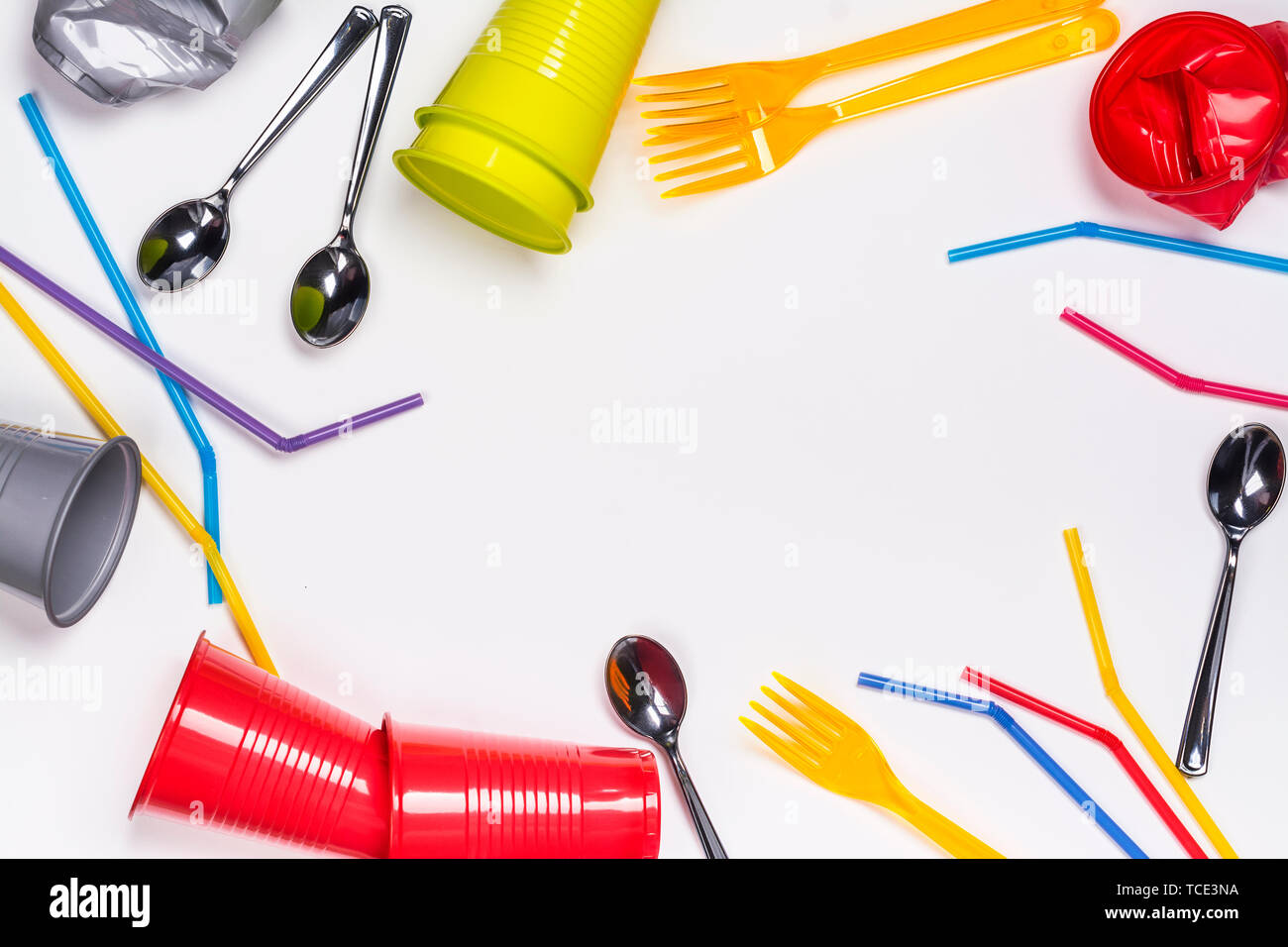 Plastic tableware on white Stock Photo - Alamy
