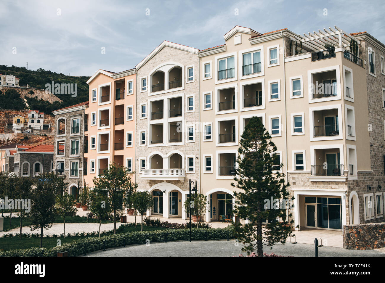 Front view of a modern apartment building or condominium or hotel ...