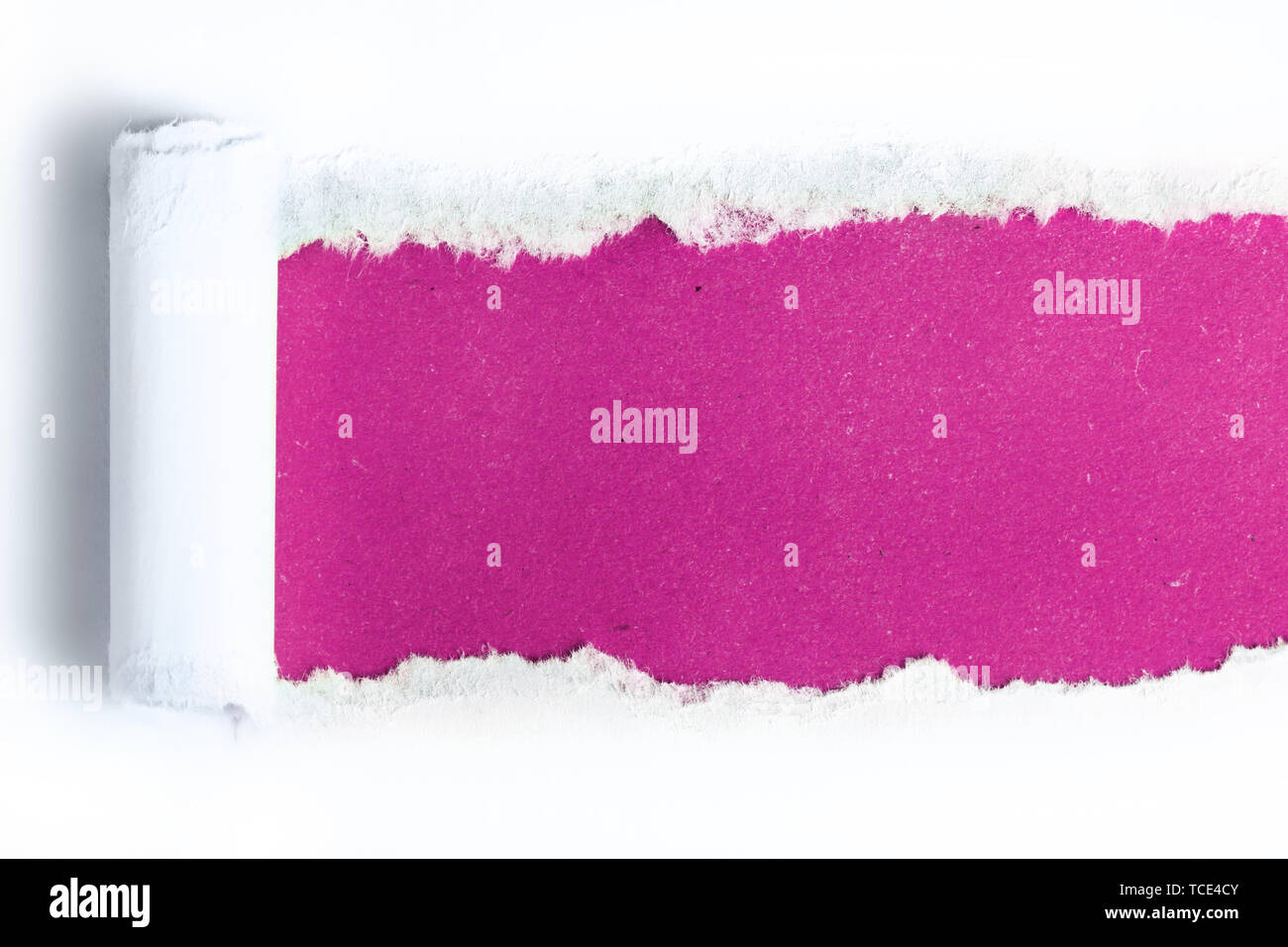 Torn paper with pink background Stock Photo - Alamy