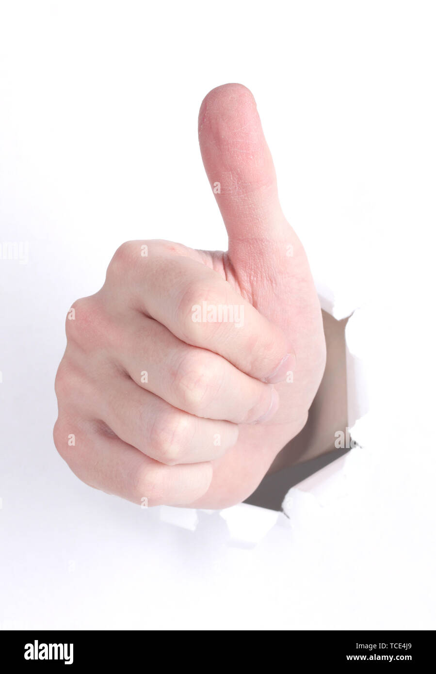 Thump up hand sign isolated on white Stock Photo - Alamy