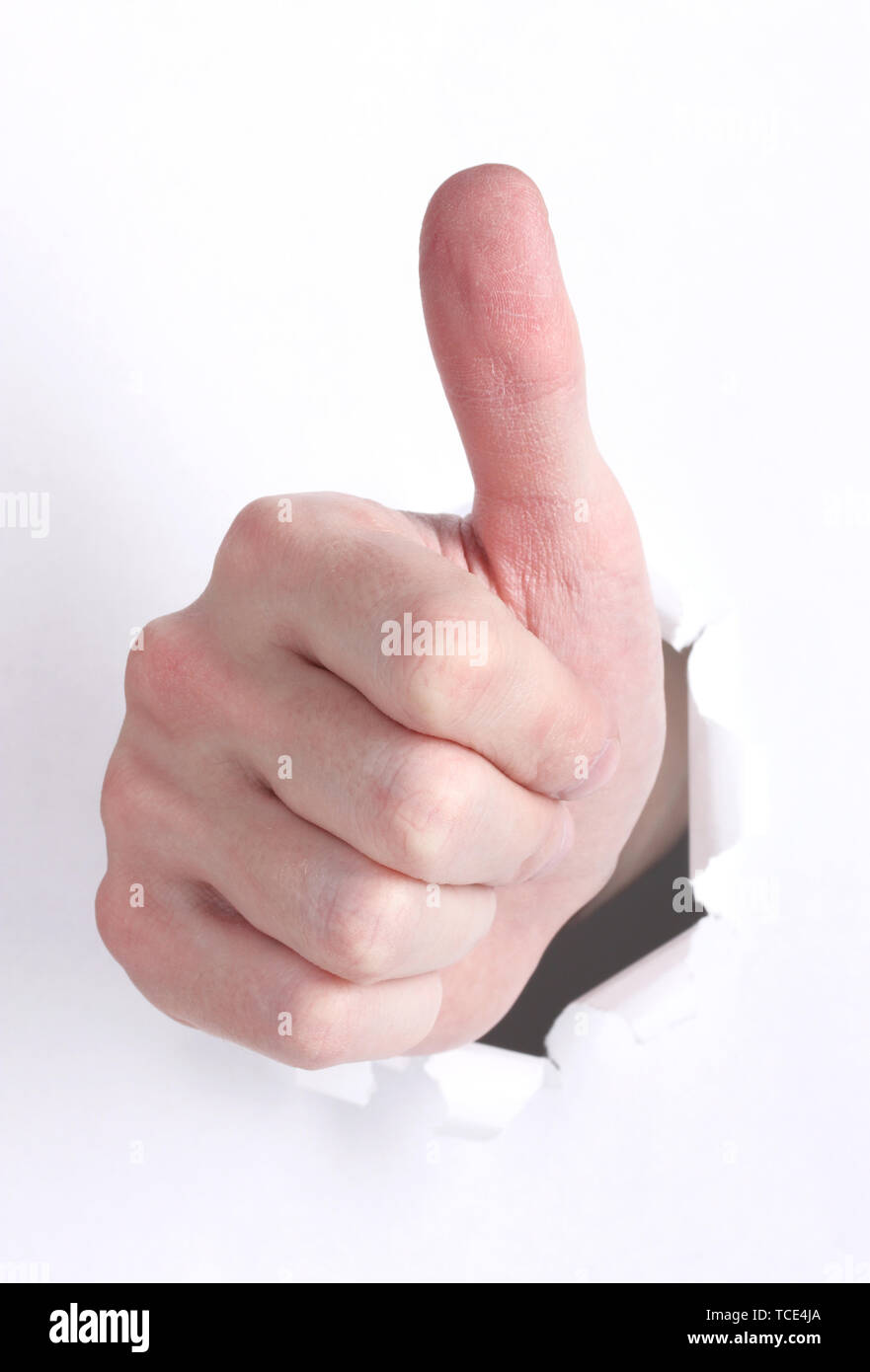 Thump up hand sign isolated on white Stock Photo - Alamy