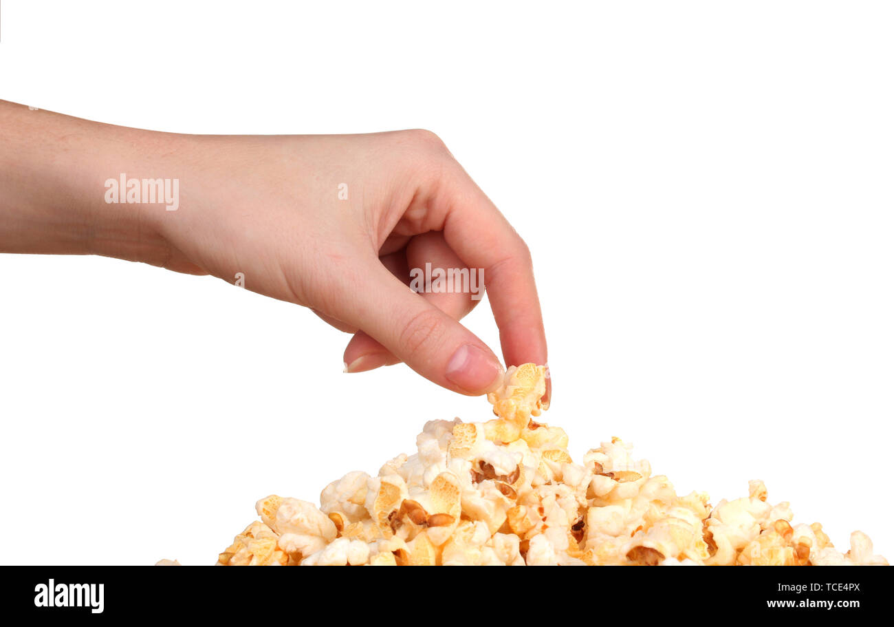 hand picking a tasty popcorn Stock Photo - Alamy