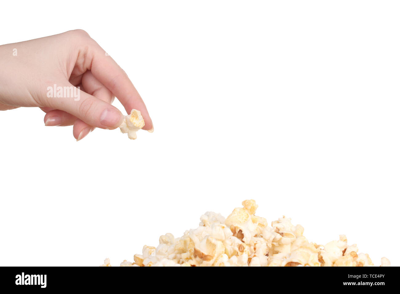 hand picking a tasty popcorn Stock Photo - Alamy