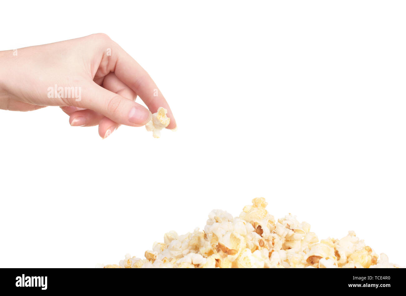 hand picking a tasty popcorn Stock Photo - Alamy