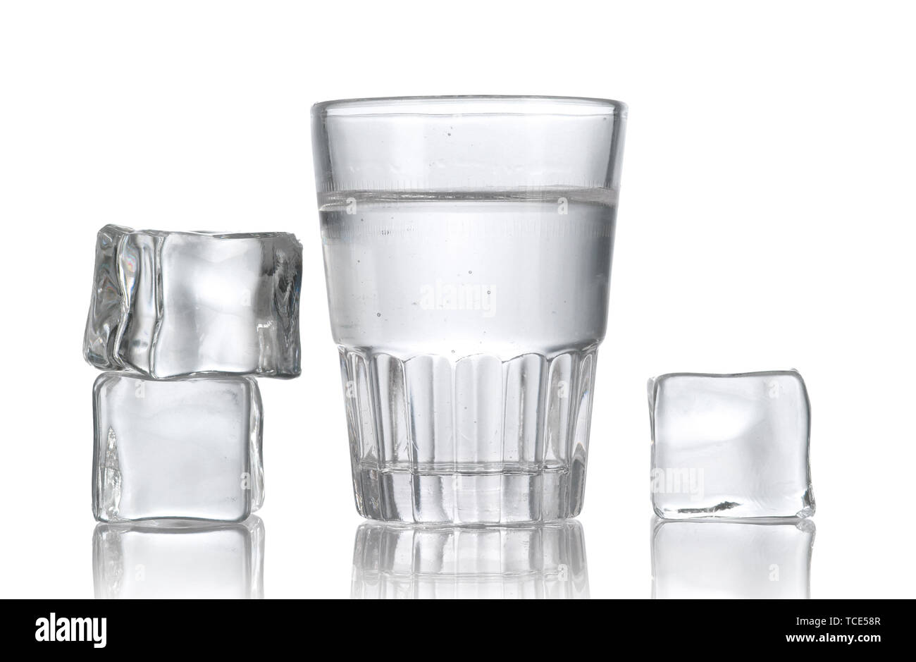 glass of vodka with ice isolaled on white Stock Photo - Alamy