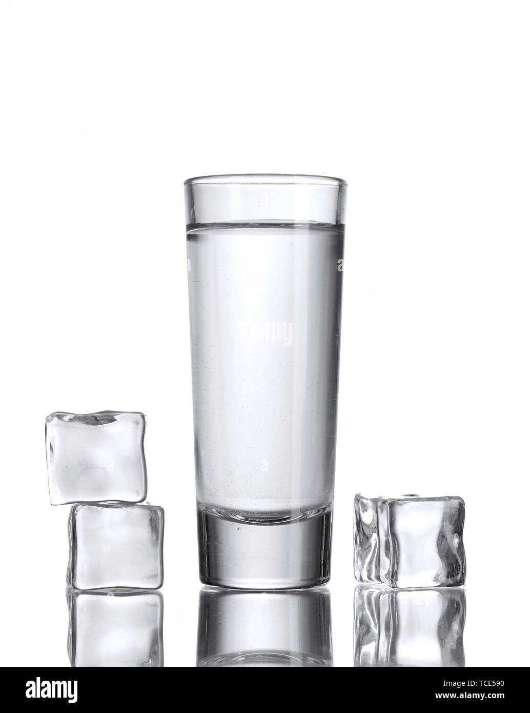 glass of vodka with ice isolaled on white Stock Photo - Alamy