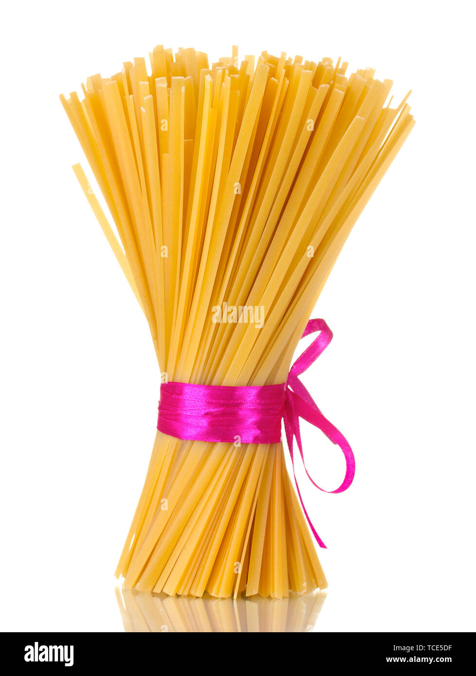 Bunch of spaghetti with ribbon isolated on white Stock Photo - Alamy