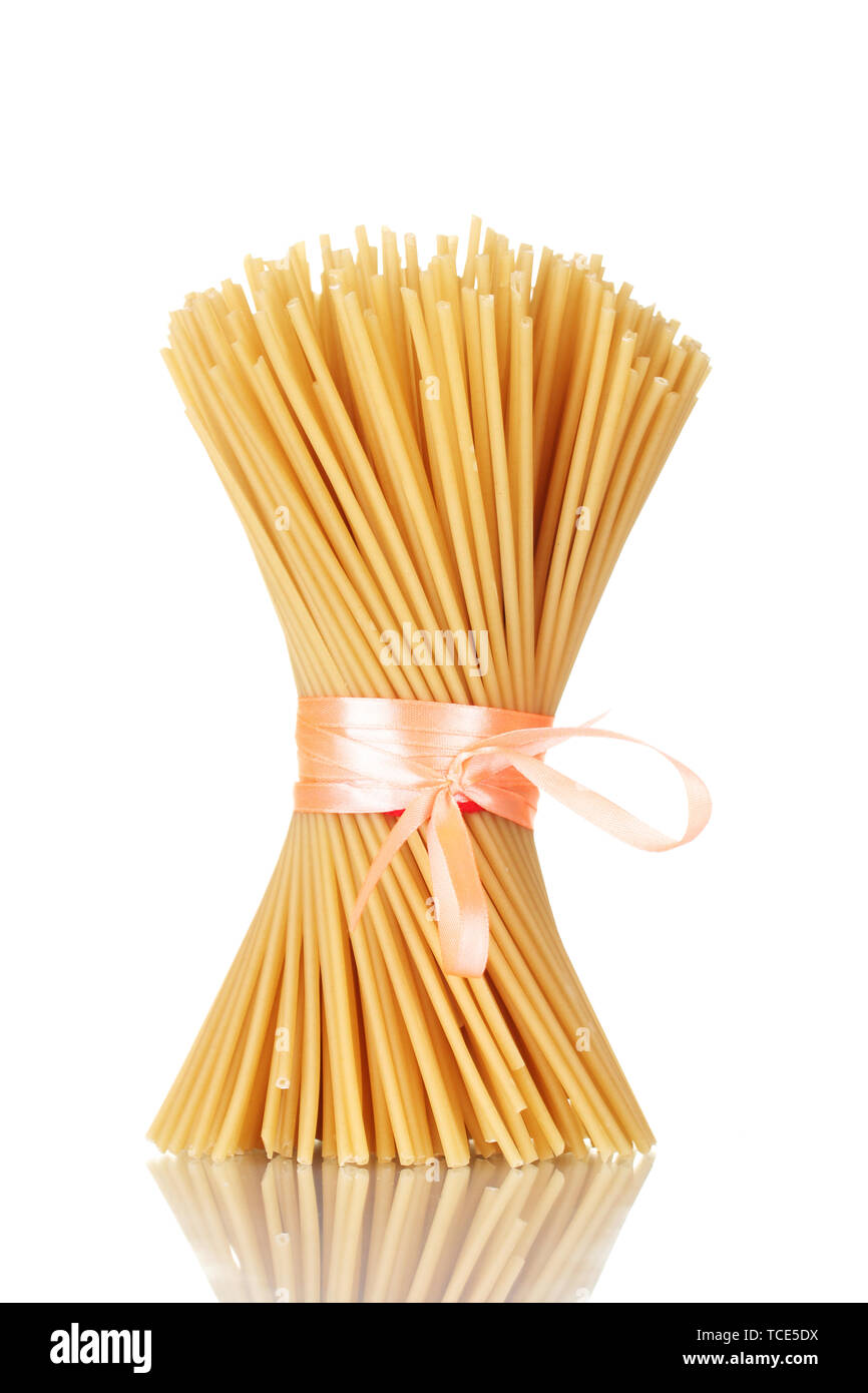 Bunch of spaghetti with ribbon isolated on white Stock Photo - Alamy
