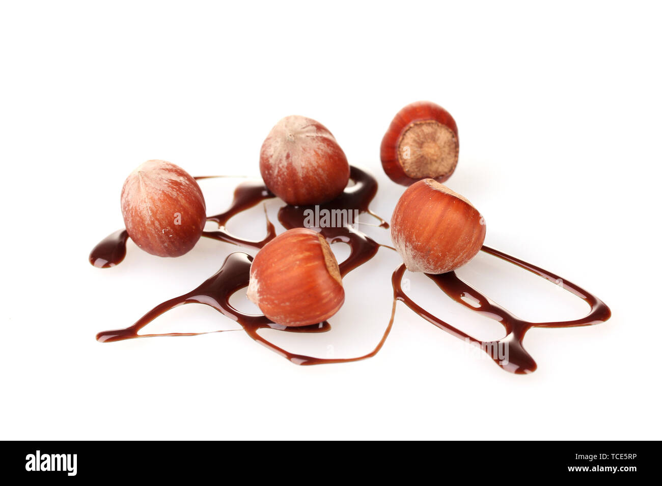 delicious hazelnut and chocolate syrup isolated on white Stock Photo ...