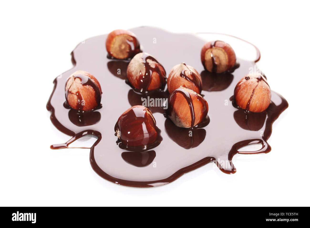 delicious hazelnut and chocolate syrup isolated on white Stock Photo ...