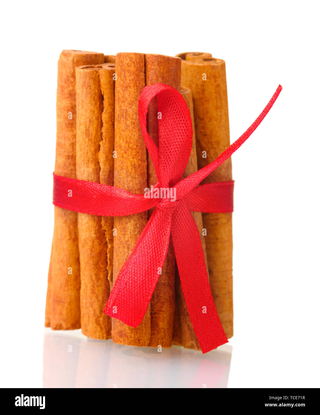 Cinnamon sticks isolated on white Stock Photo - Alamy