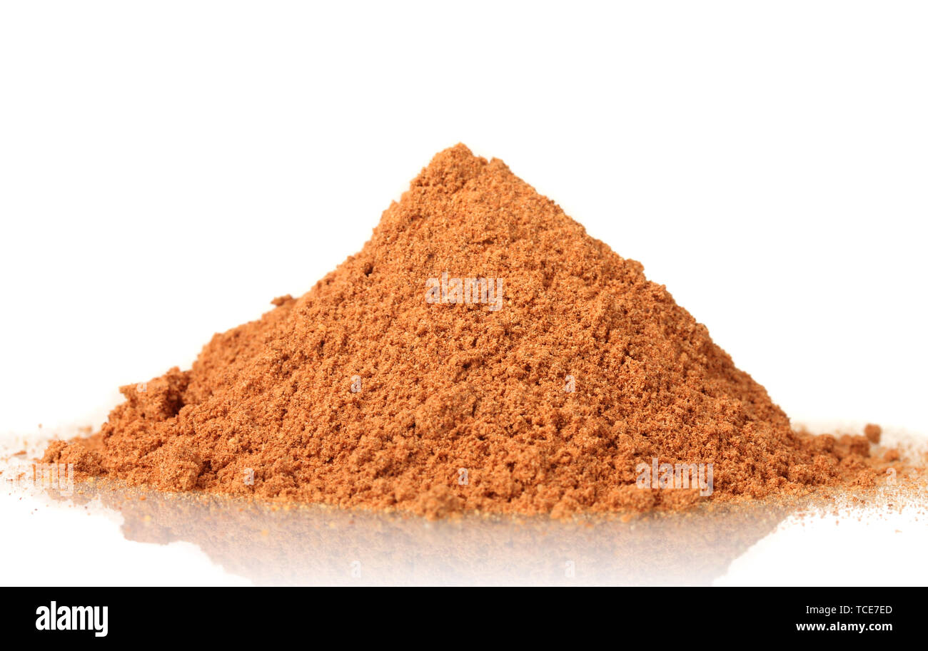 Cinnamon powder isolated on white Stock Photo - Alamy